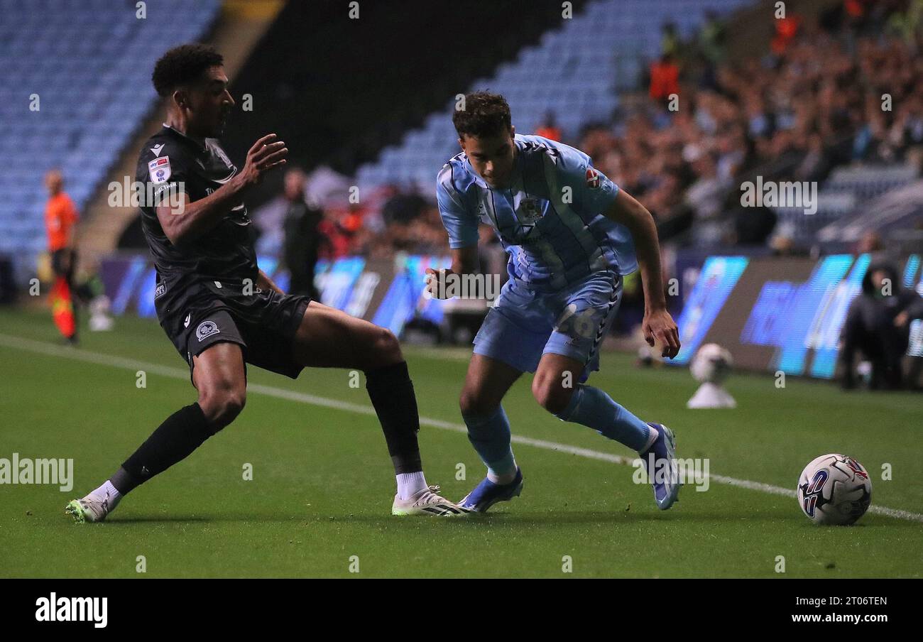 Blackburn Rovers' James Hill (left) and Coventry City's Yasin Ayari ...