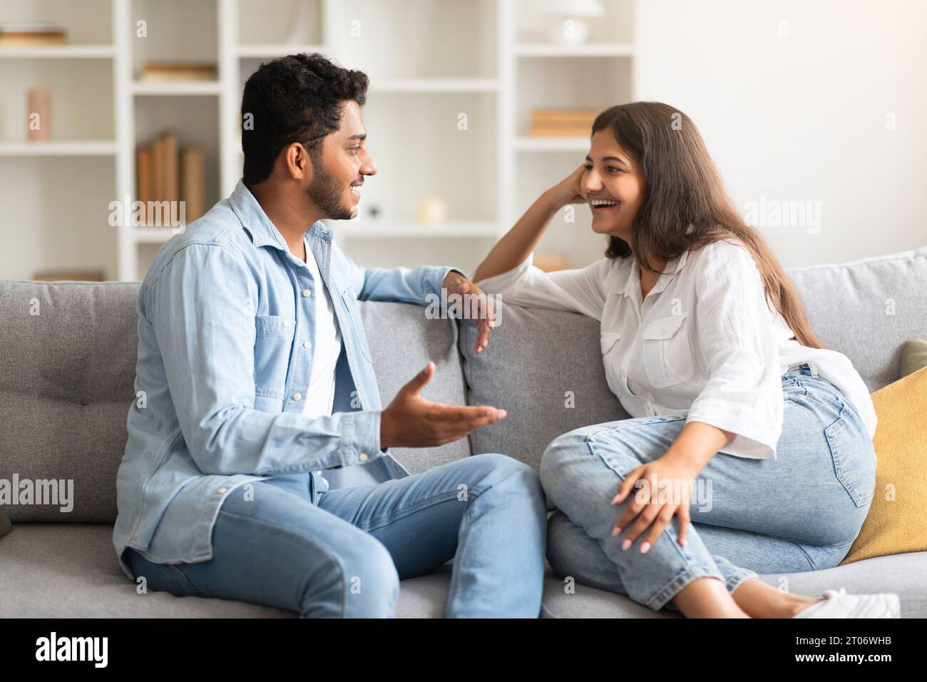 Young loving indian couple talking and flirting enjoying conversation ...