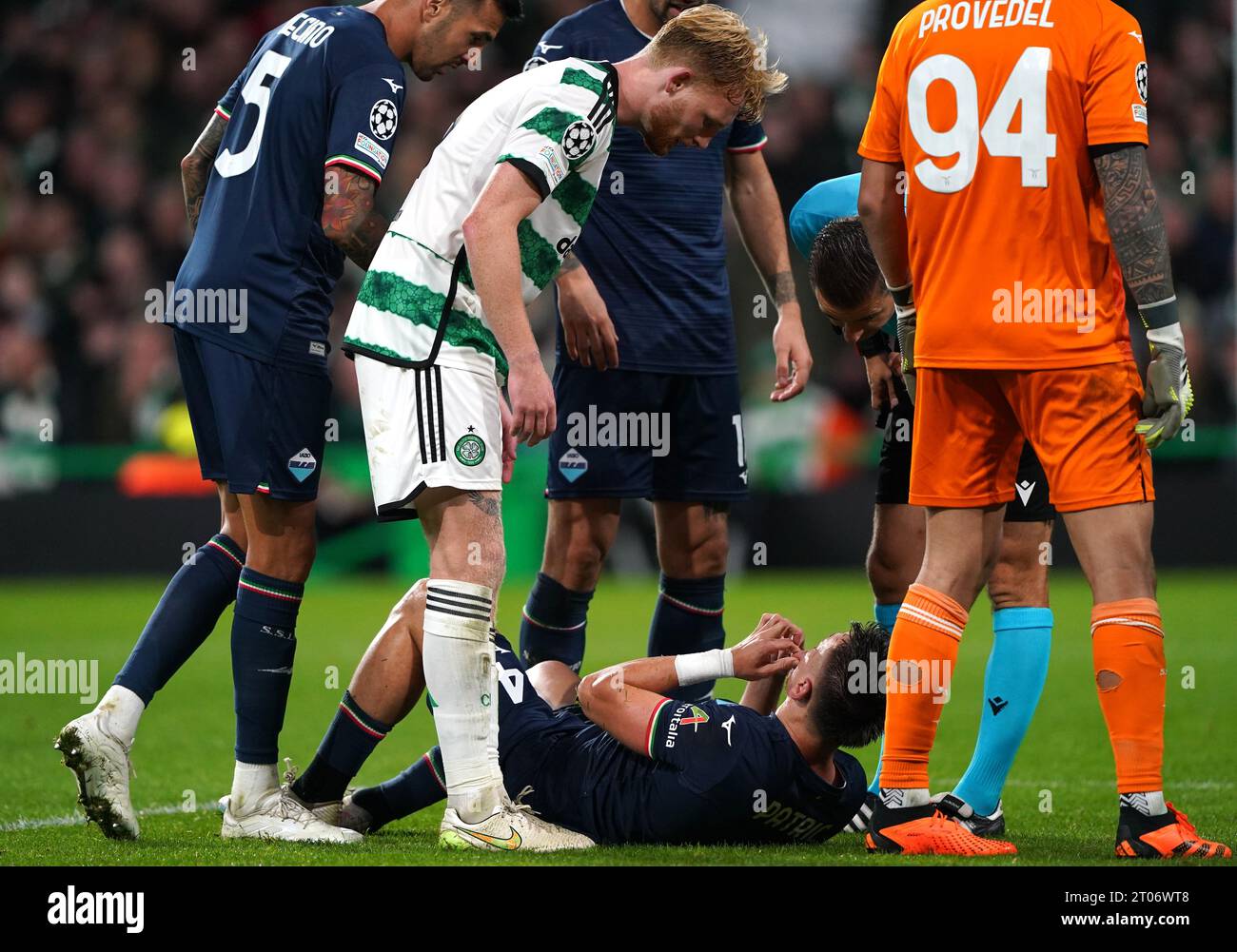 Lazio's Patric reacts to an injury during the UEFA Champions League ...