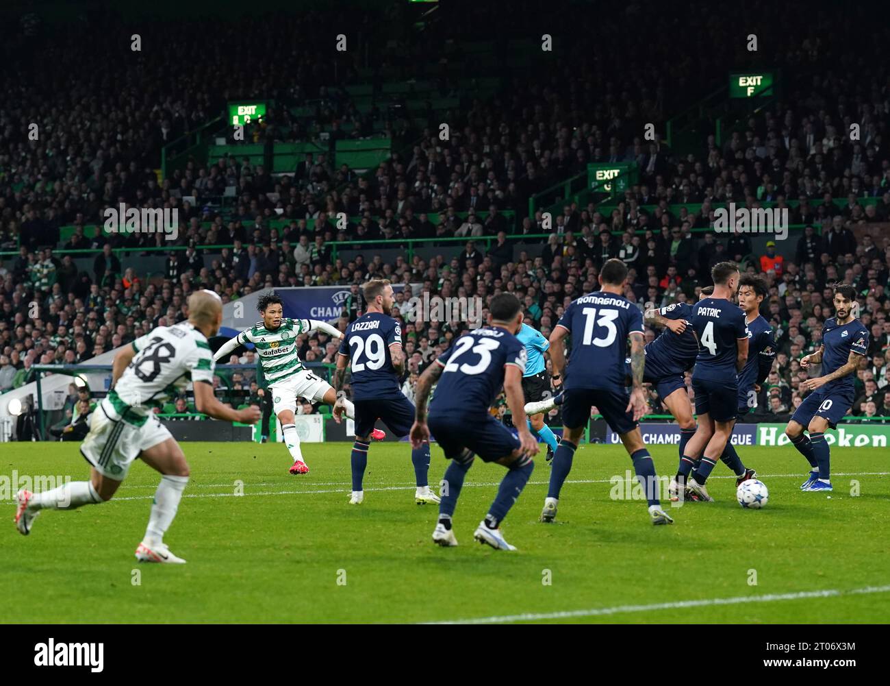 Celtic's Reo Hatate (second left) attempts a shot on goal during the ...