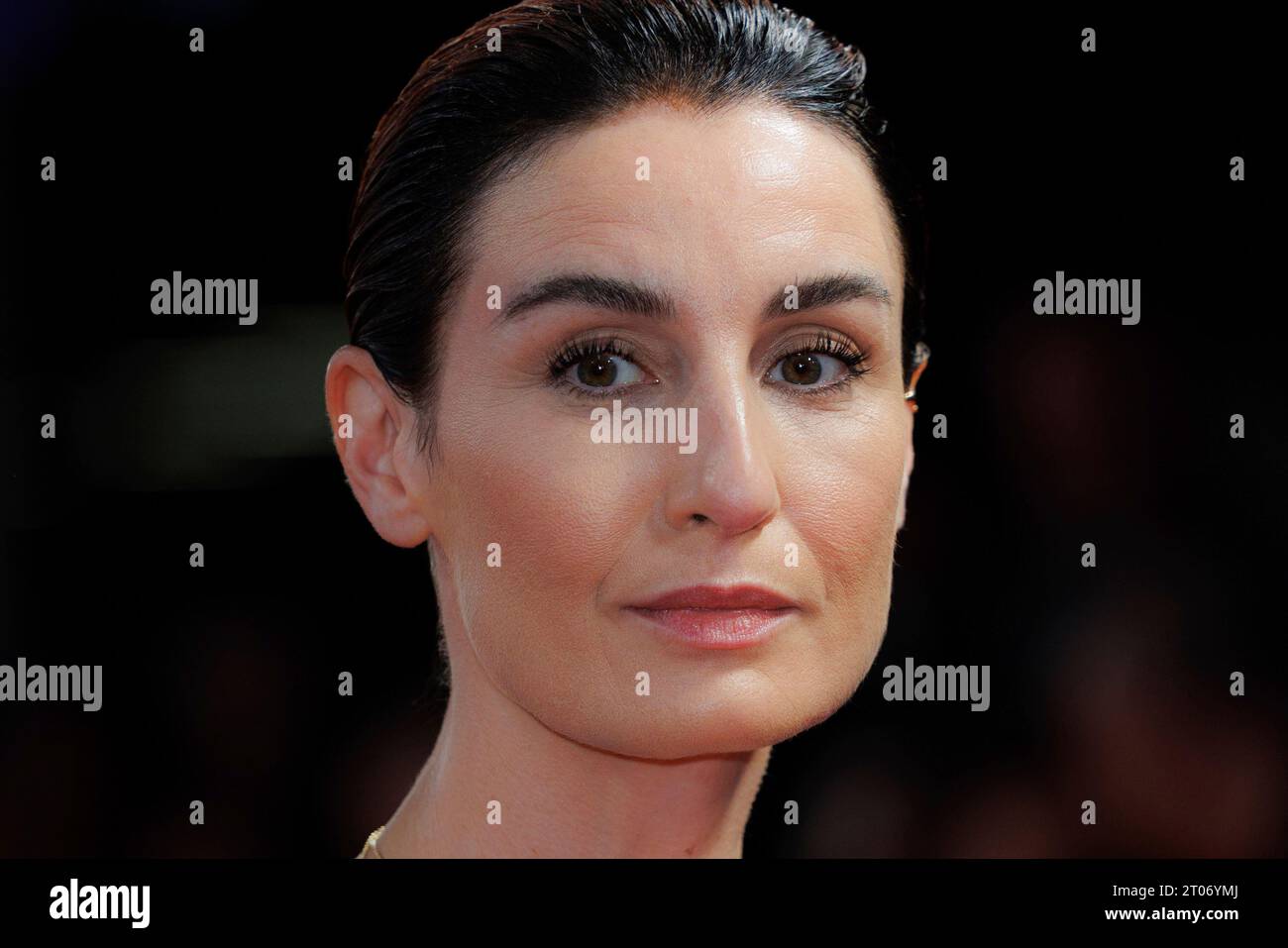 Erin O'Connor poses for photographers upon arrival for the premiere of ...
