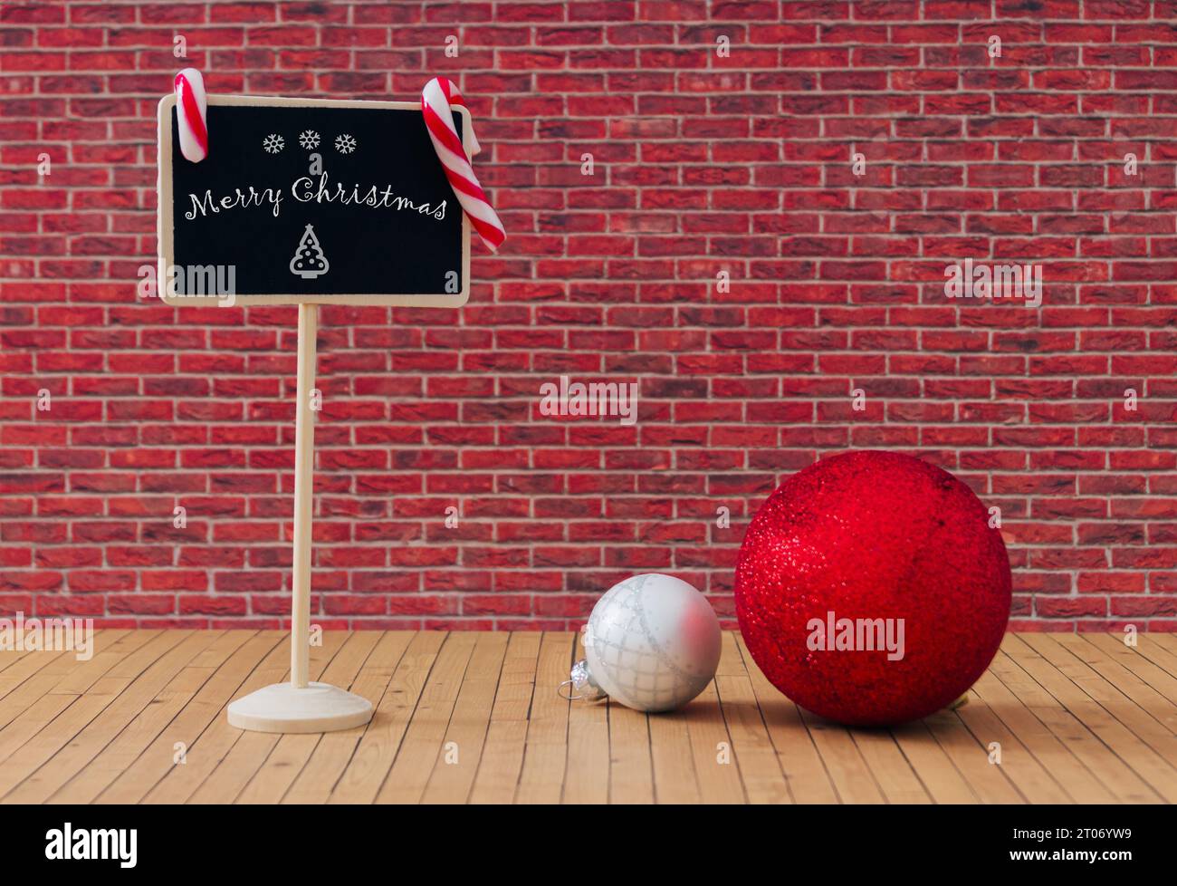 Creative composition made with Christmas baubles and Merry Christmas ...