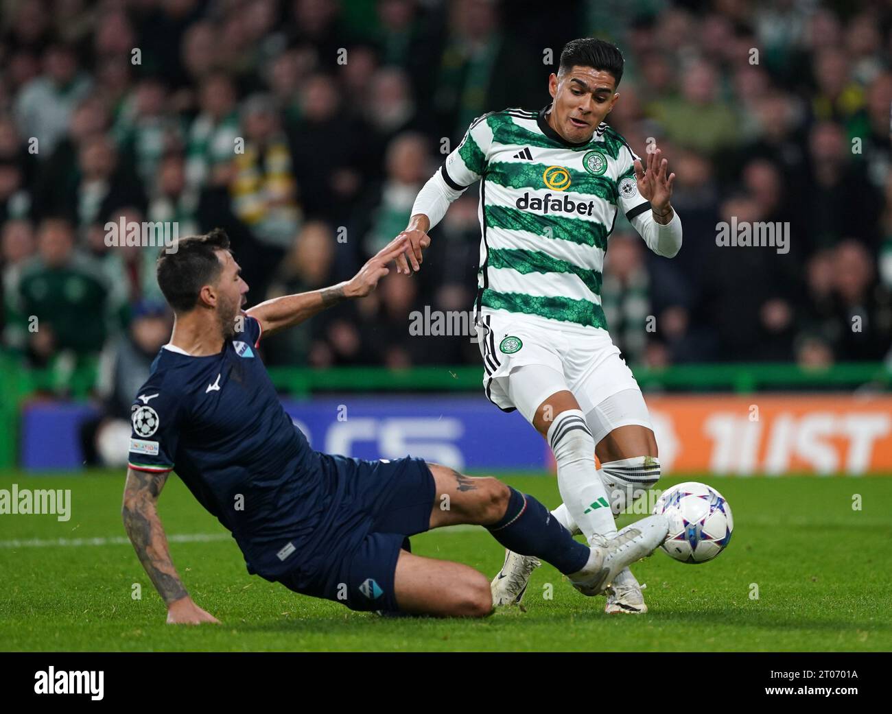 Lazio's Alessio Romagnoli and Celtic's Luis Palma battle for the ball ...