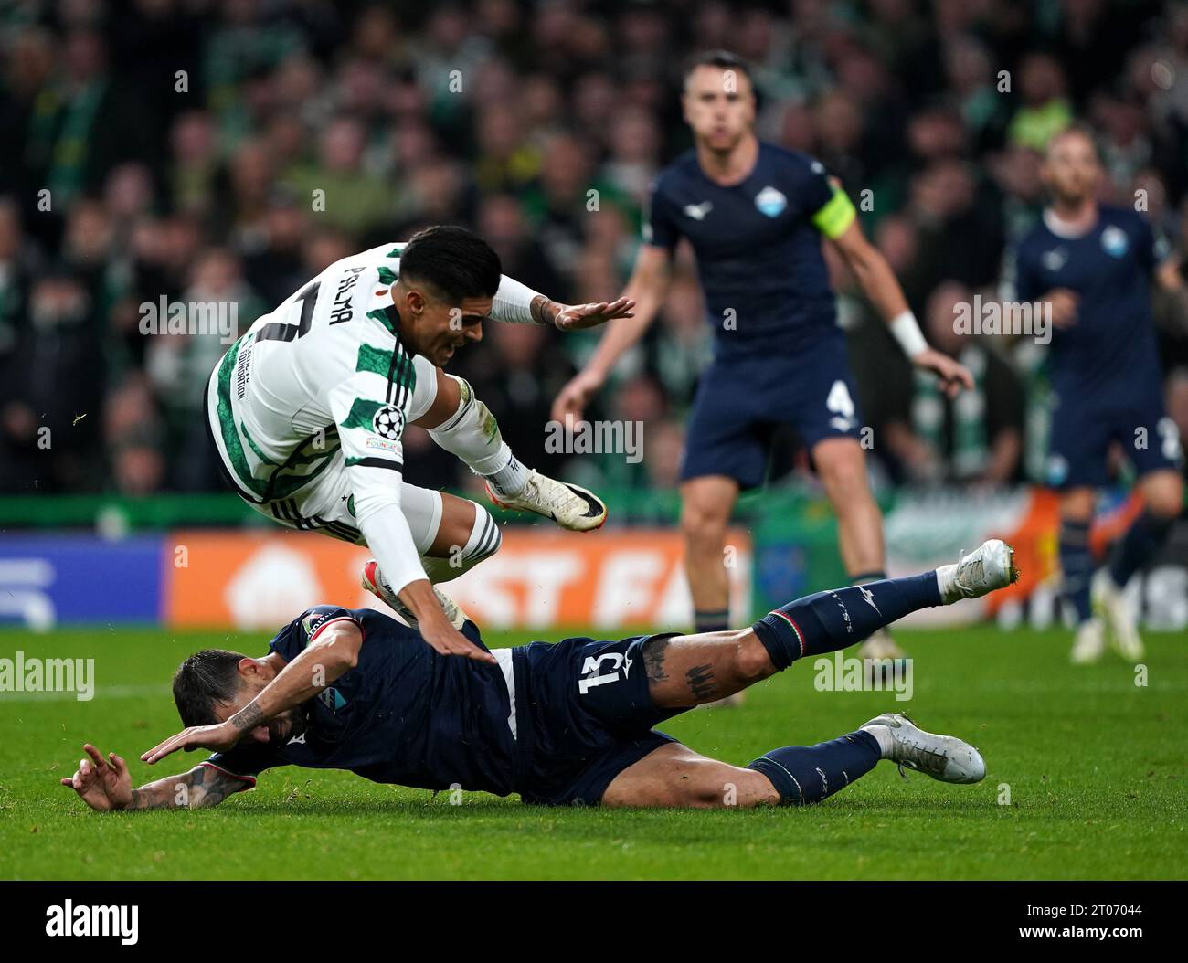 Lazio's Alessio Romagnoli and Celtic's Luis Palma battle for the ball ...