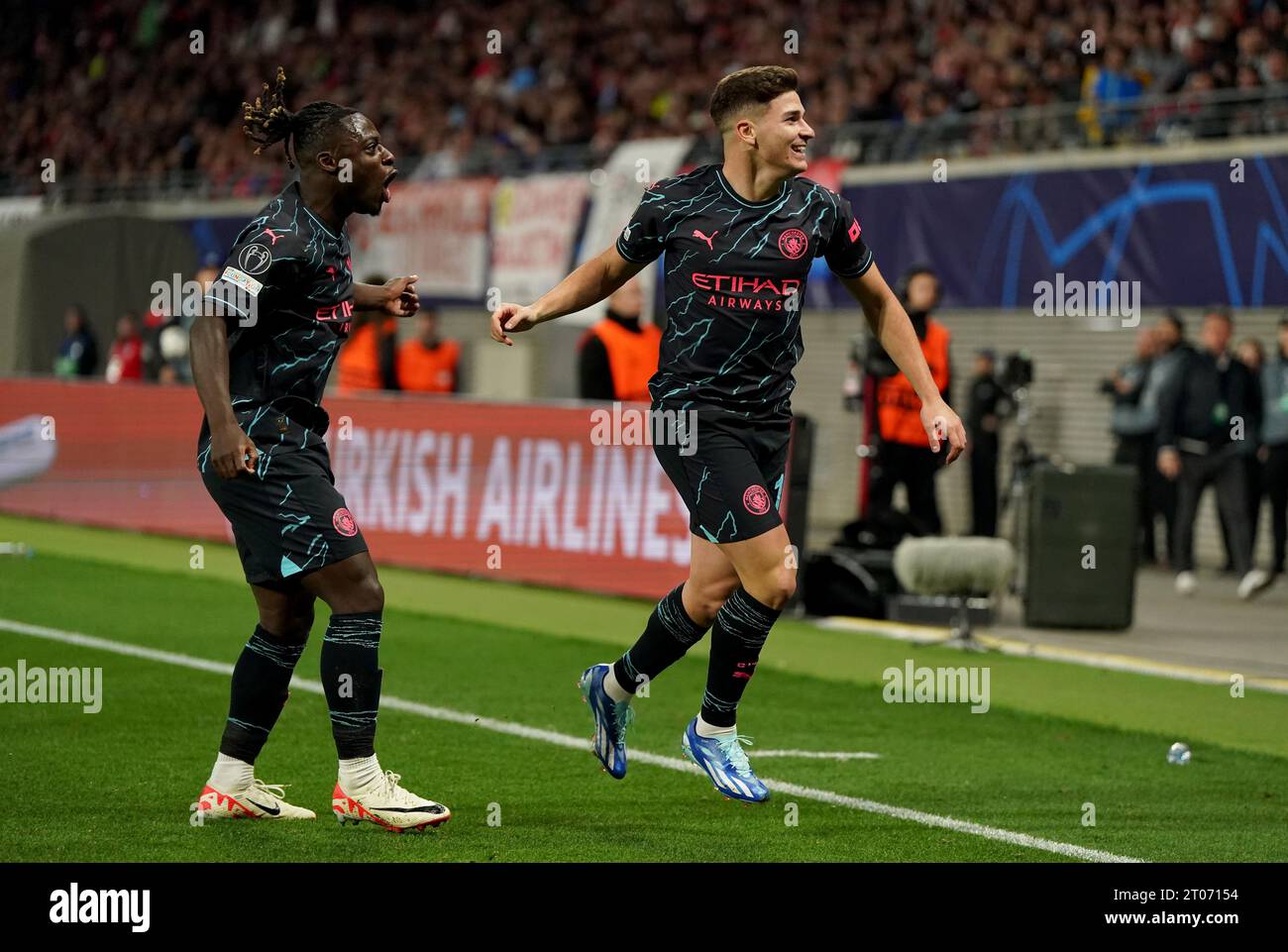 Manchester Citys Julian Alvarez Celebrates With Manchester Jeremy Doku After Scoring Their Side