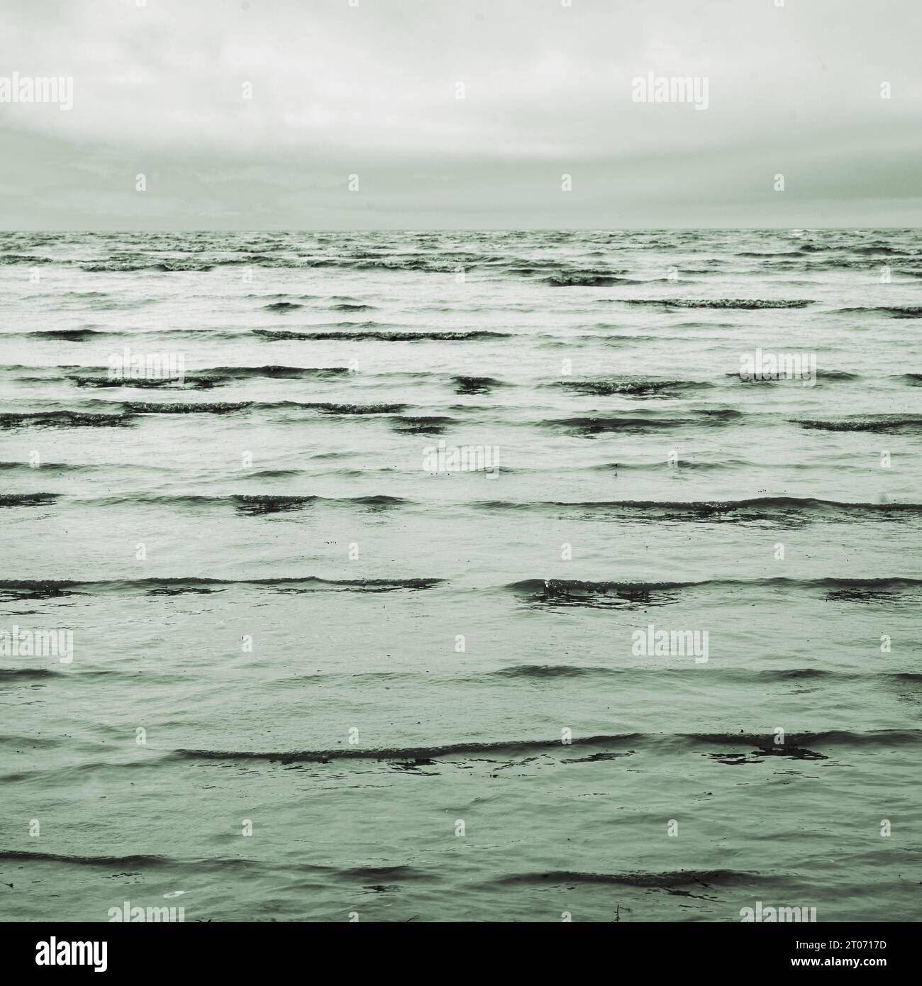 Small linear waves in shallow water Stock Photo - Alamy