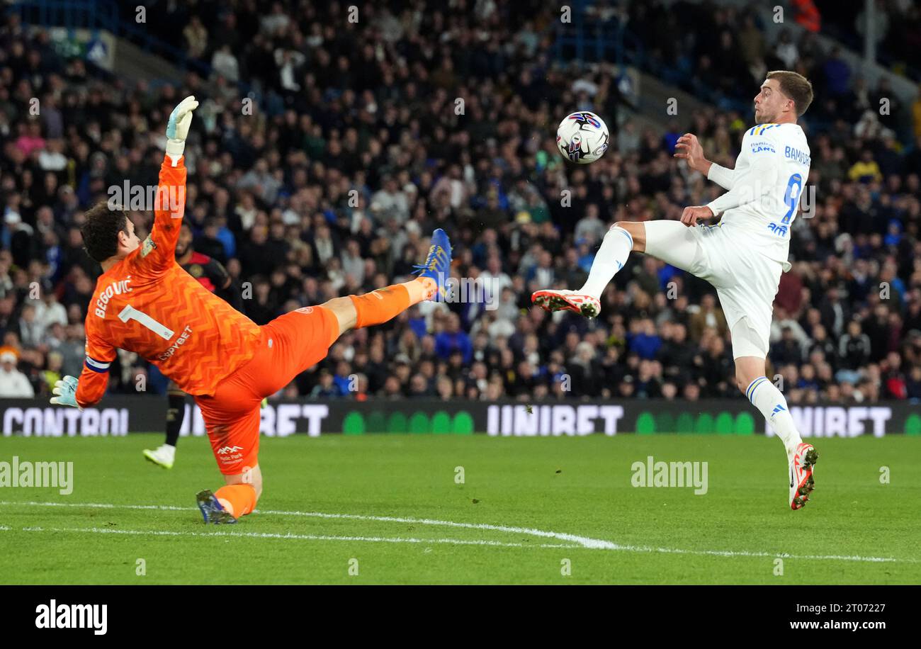Leeds United's Patrick Bamford and Queens Park Rangers goalkeeper Asmir ...