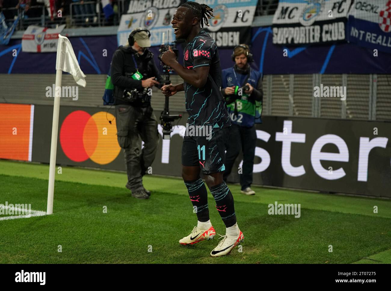 Manchester City's Jeremy Doku celebrates scoring their side's third ...