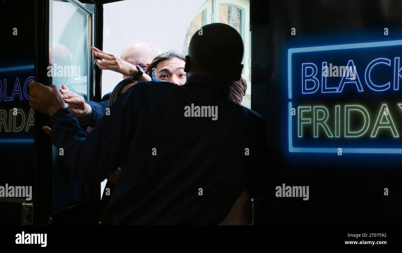 Crazy shoppers breaking down door during black friday promotions at ...
