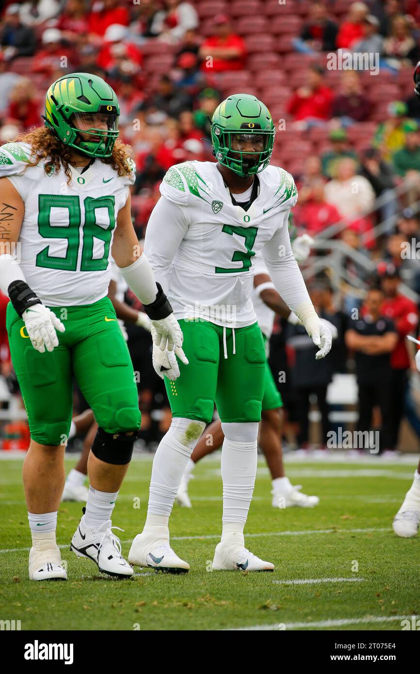 PALO ALTO, CA - SEPTEMBER 30: Oregon Ducks DL Casey Rogers (98) and DE Brandon Dorlus (3) move ...