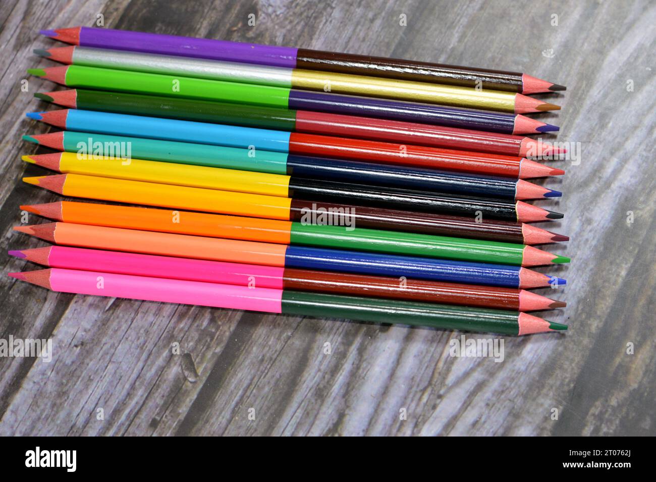 wood color pencils of different colors for painting isolated on wooden ...