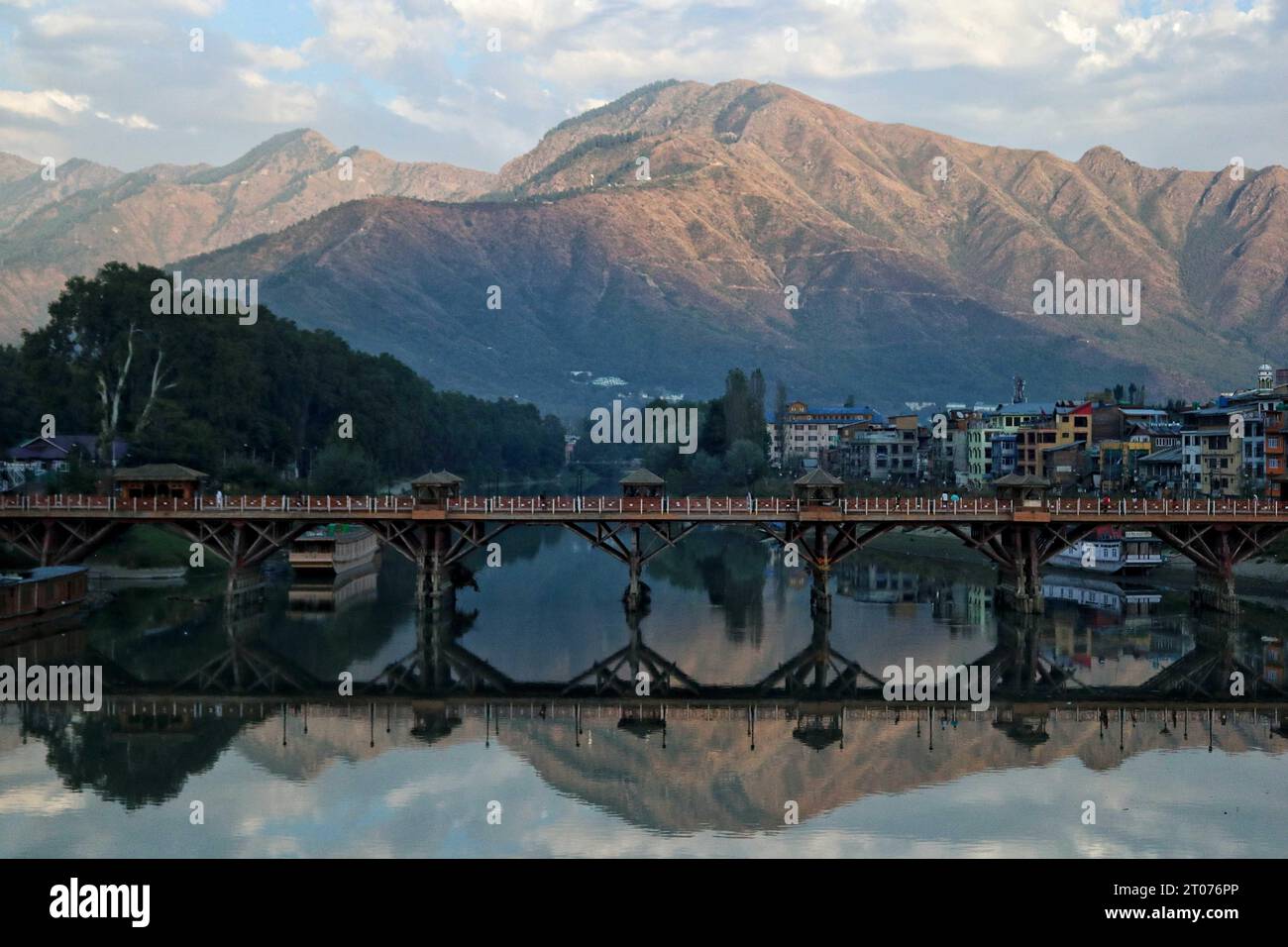 October 04,2023, Srinagar Kashmir, India : People walk over a wooden ...