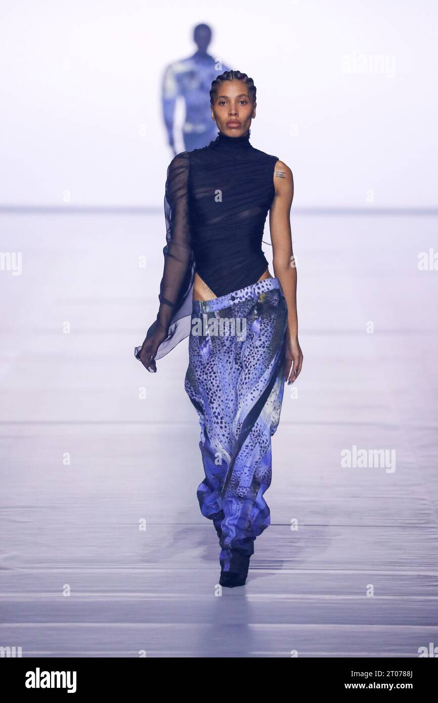 Paris, France. 02nd Oct, 2023. Model Kai Isaiah Jamal walks on the ...