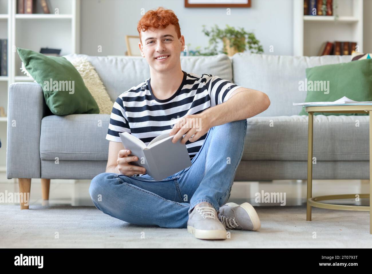 Young redhead man reading hi-res stock photography and images - Alamy