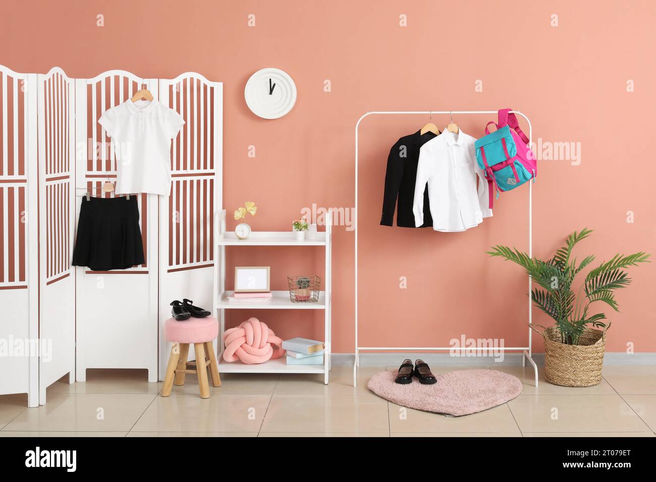 Folding screen, shelving unit, clock, shoes, backpack and stylish ...