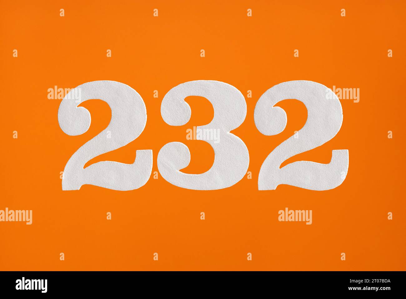 Number 232 - White digits on orange background Stock Photo - Alamy