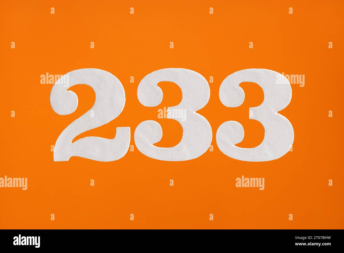 Number 233 white figures on orange background Stock Photo - Alamy