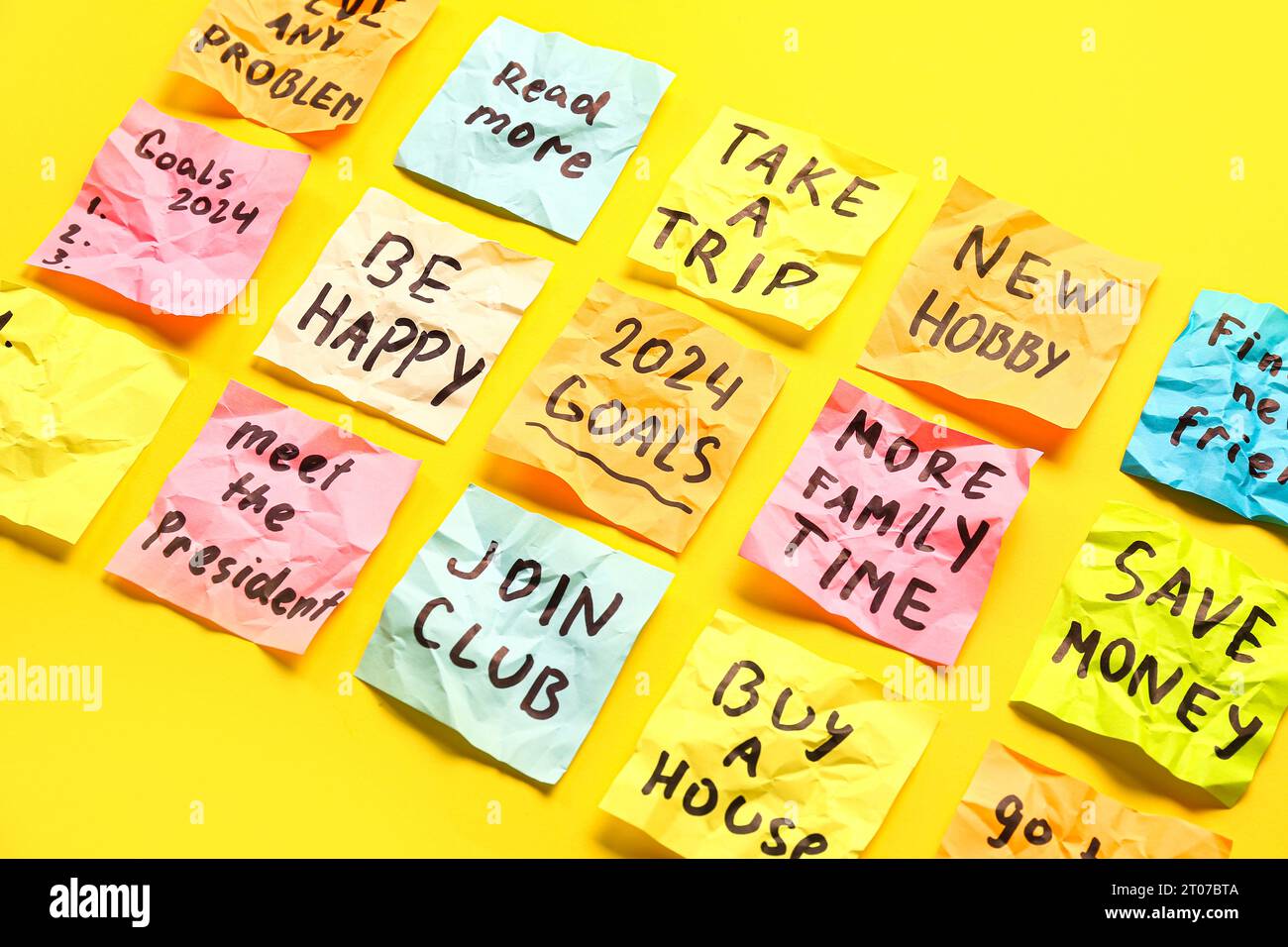 Sticky notes with different goals for 2024 on yellow background Stock ...