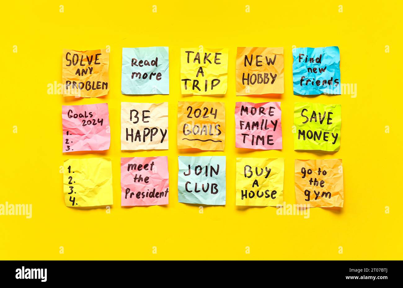 Sticky notes with different goals for 2024 on yellow background Stock ...