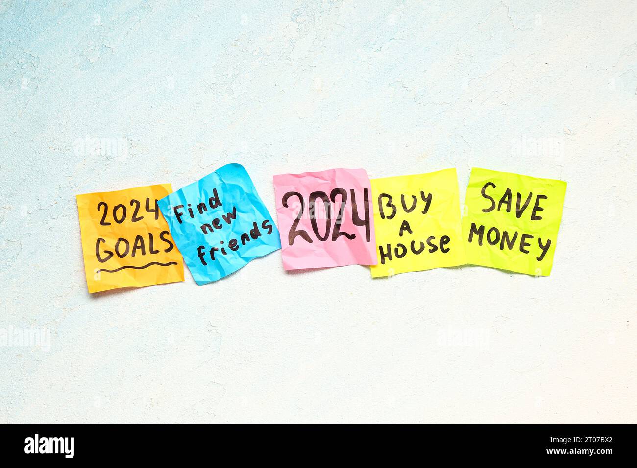 Sticky notes with different goals for 2024 on gradient background Stock ...