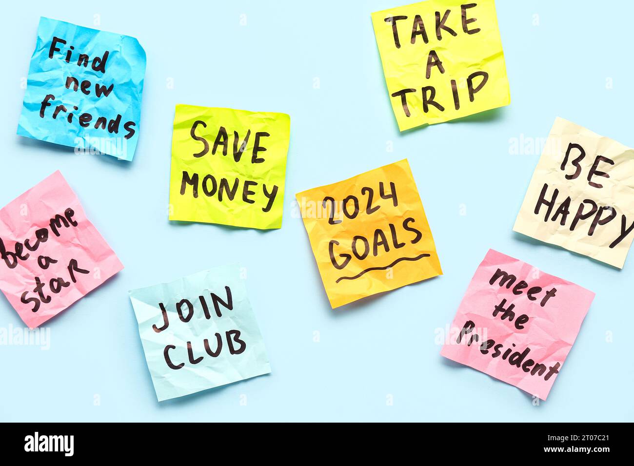 Sticky notes with different goals for 2024 on blue background Stock ...