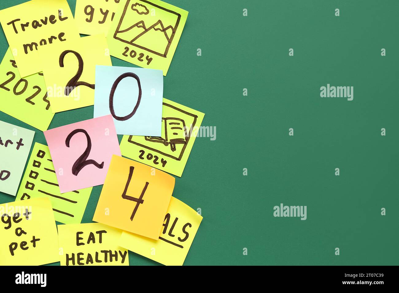 Sticky notes with different goals for 2024 on green background Stock ...