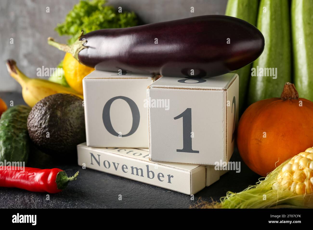 Fresh vegetables, fruits and cube calendar with date NOVEMBER 1 on ...
