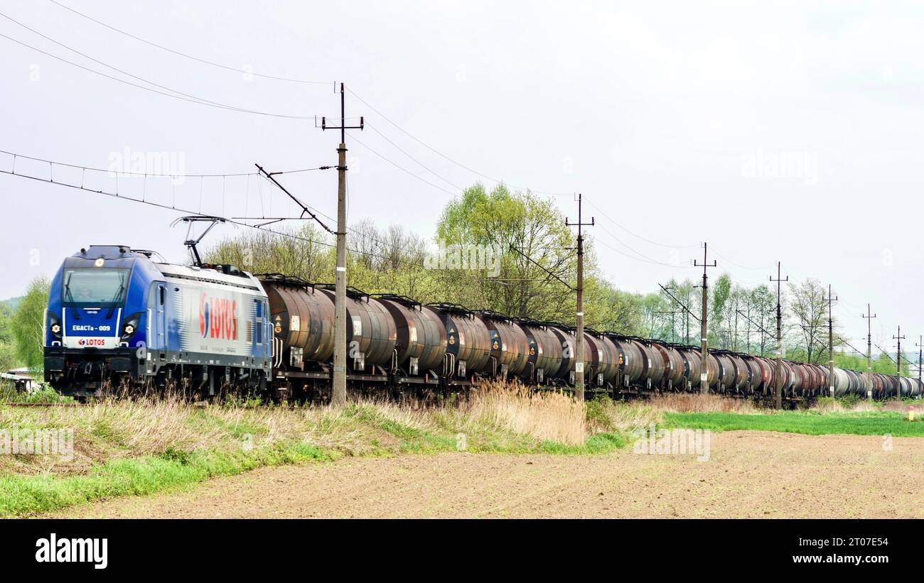 Jaslo, Poland - May 8, 2023: Movement of a freight train on the railway ...