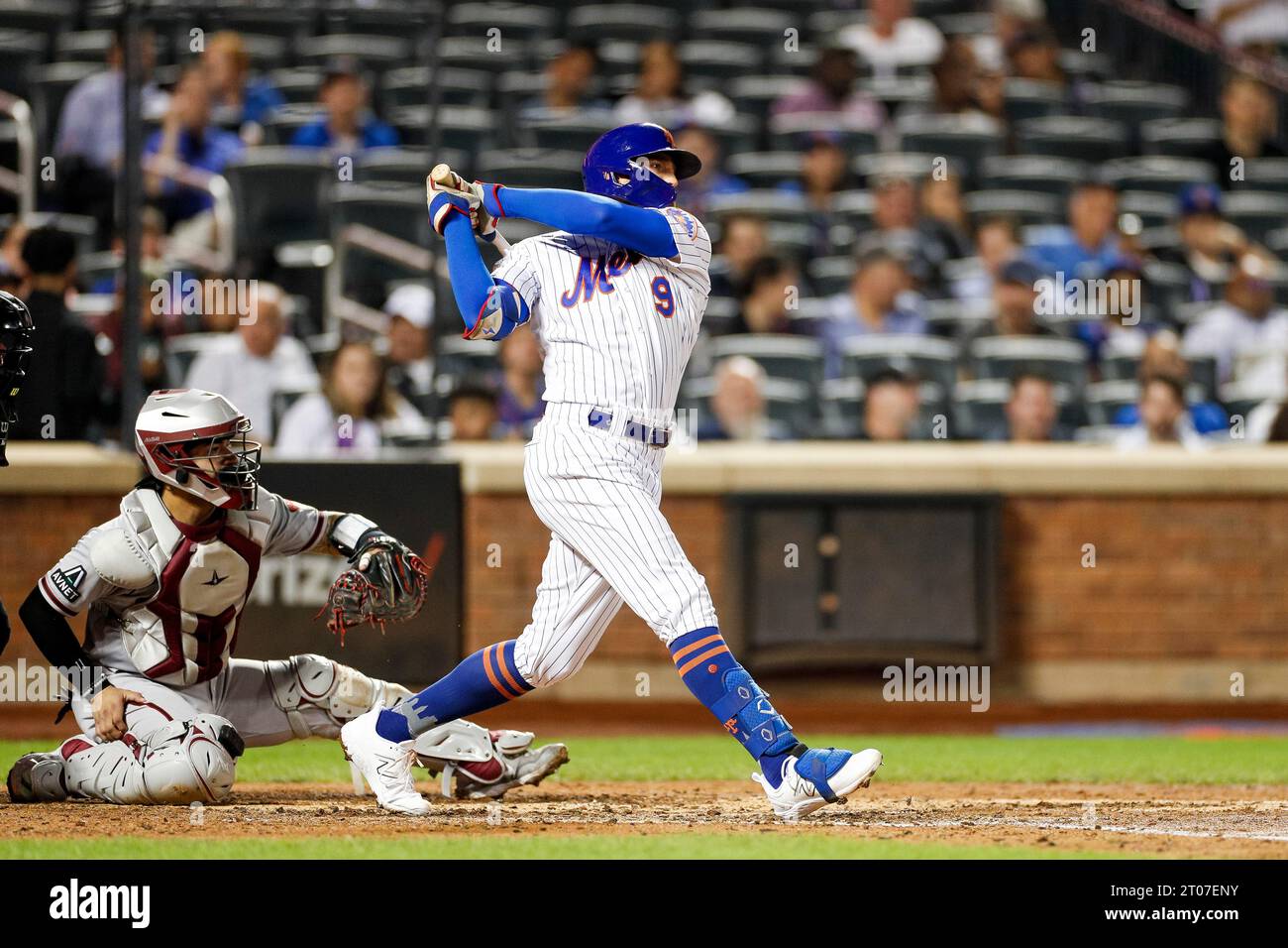 New York Mets center fielder Brandon Nimmo (9) hits a double in the ...