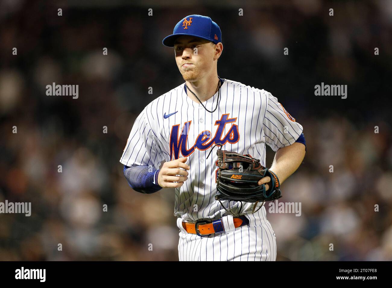 New York Mets third baseman Brett Baty (22) jogs off the field during a ...