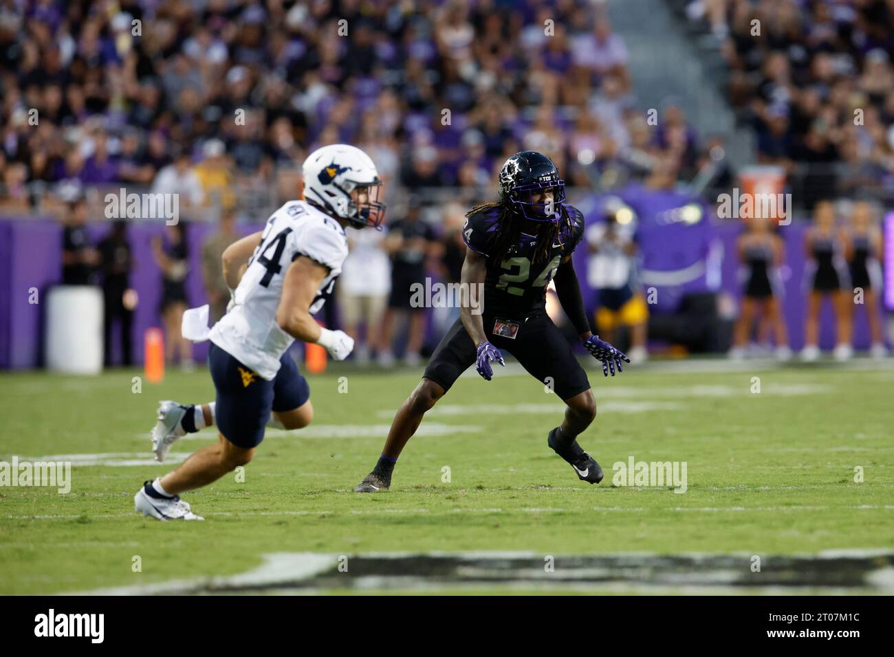 TCU defensive back Avery Helm (24) looks to defend against Hudson ...