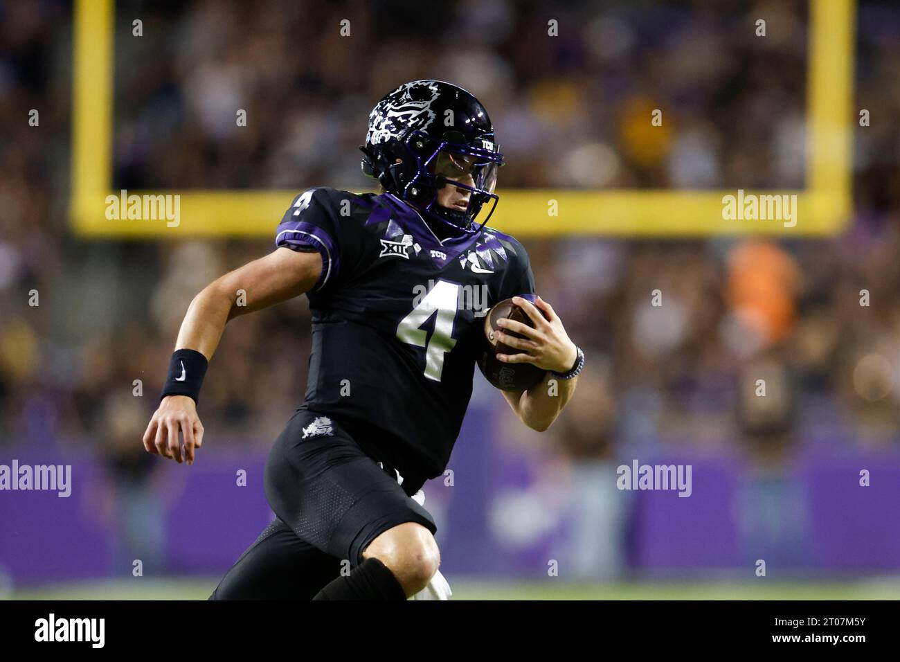TCU quarterback Chandler Morris (4) carries the ball during an NCAA ...