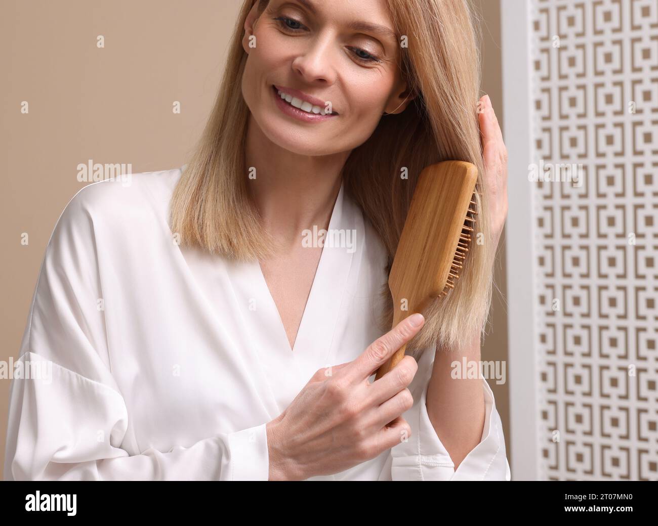 Beautiful woman in white robe hi-res stock photography and images - Alamy