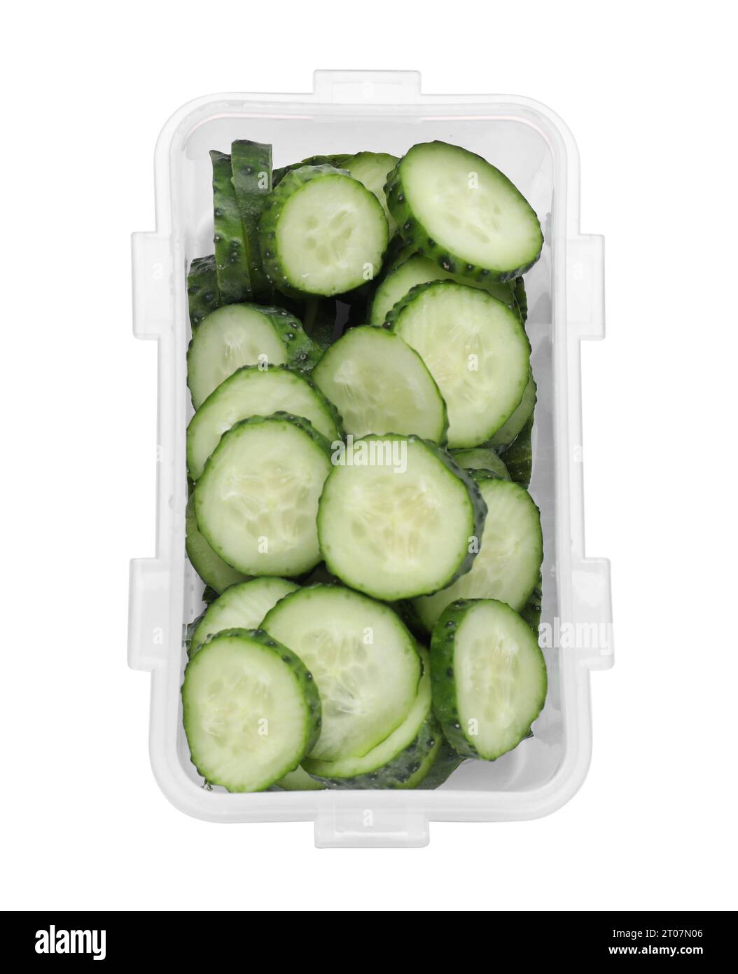 Plastic container with fresh cut cucumbers isolated on white, top view ...