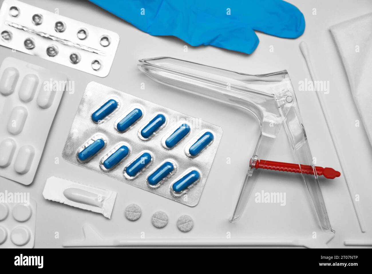 Sterile gynecological examination kit and medicaments on beige ...