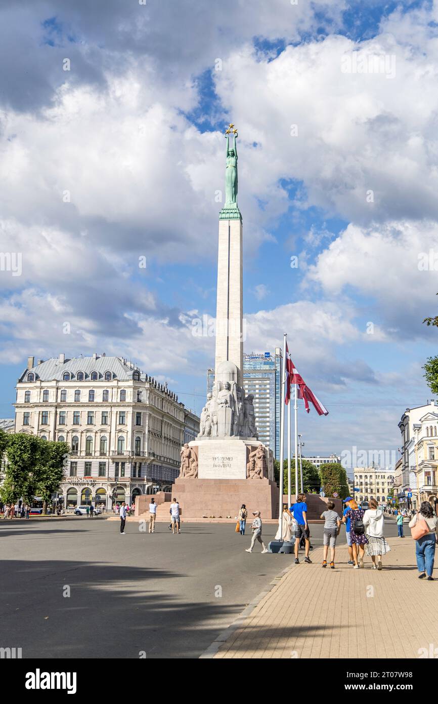 Riga, Latvia- July 7, 2023: Monument of Woman Milda holding three gold ...