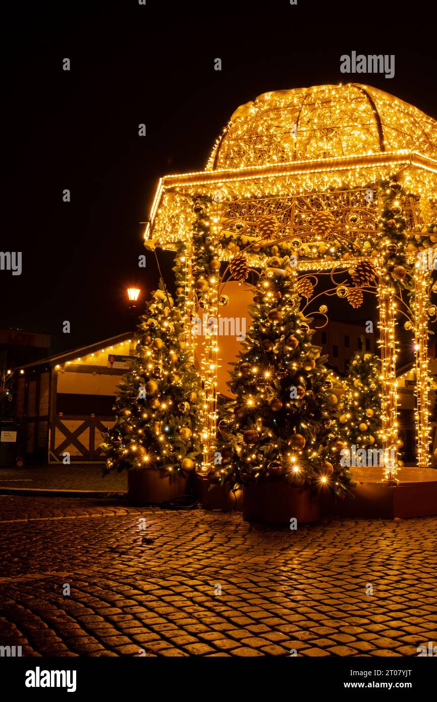 Holiday Decorated and illuminated street at night in Gdansk Poland ...