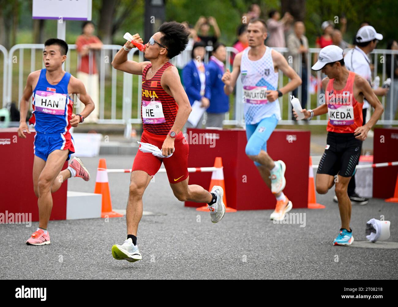 Hangzhou, China's Zhejiang Province. 5th Oct, 2023. He Jie(front) of ...