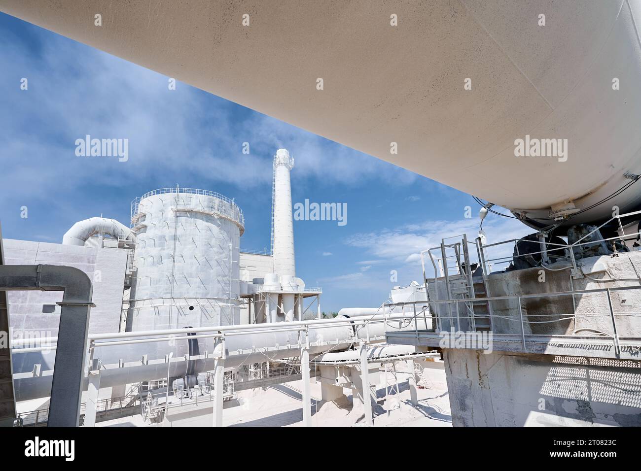 Limestone burning rotary furnace as pipe at industrial plant Stock ...