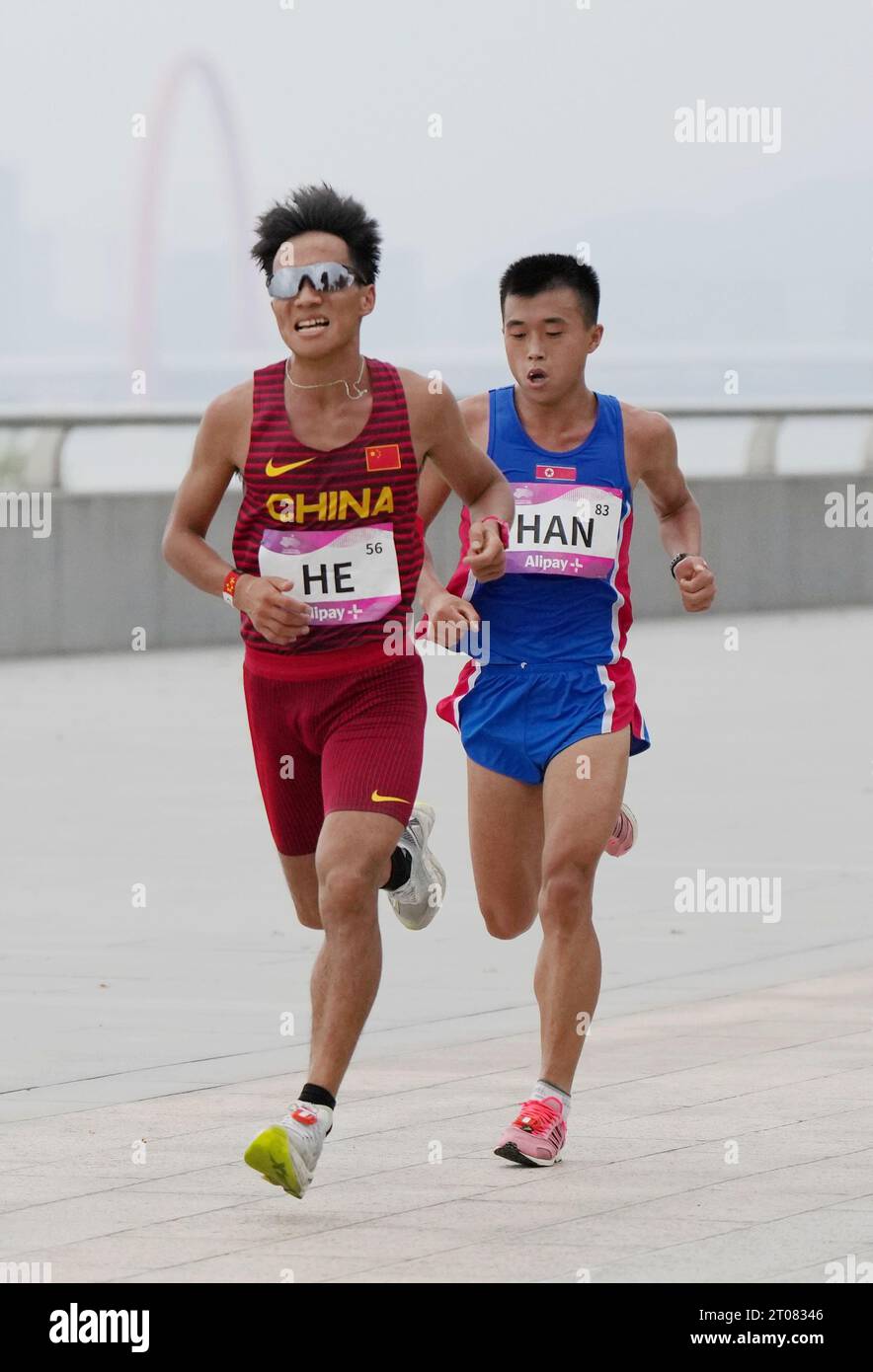 Hangzhou, China's Zhejiang Province. 5th Oct, 2023. He Jie (L) of China ...