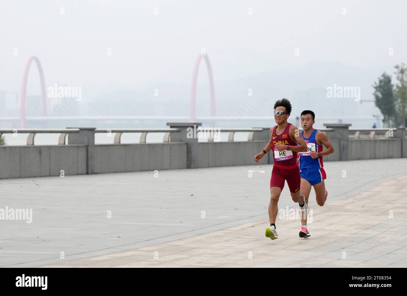 Hangzhou, China's Zhejiang Province. 5th Oct, 2023. He Jie (L) of China ...