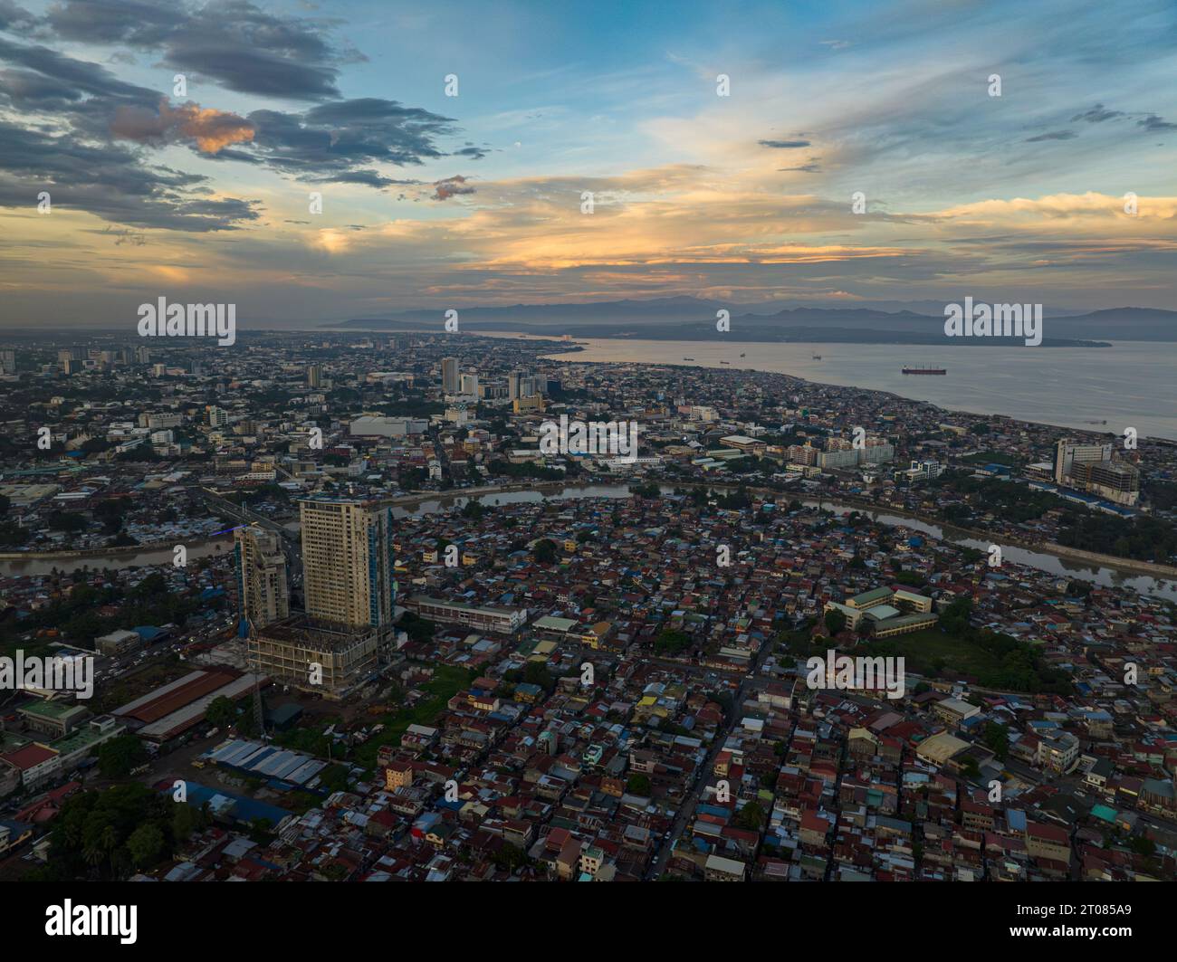 Coastal city with modern buildings and river. Davao City. Mindanao ...