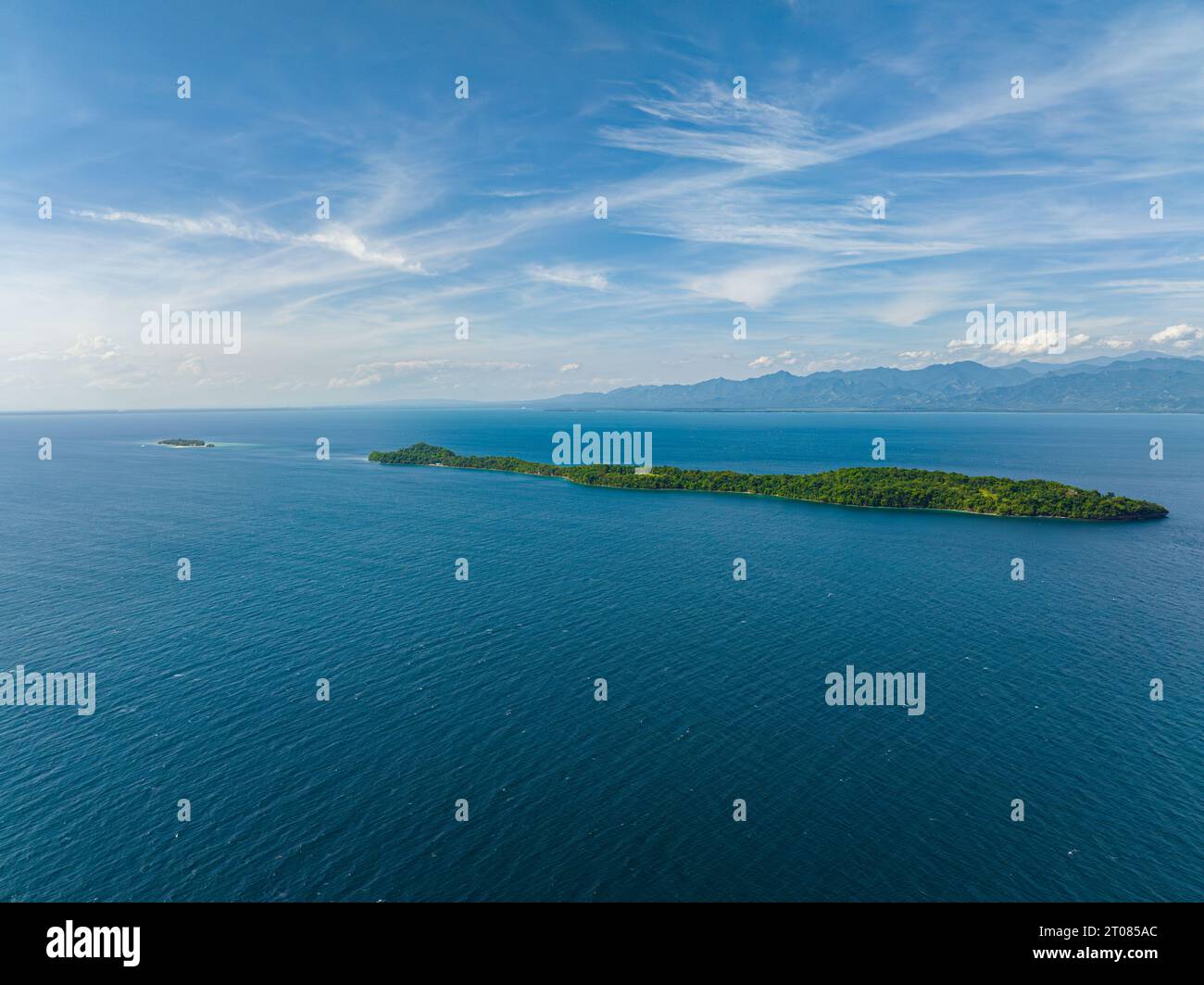 Tropical Island and blue sea in the Philippines. Samal, Davao. Seascape ...