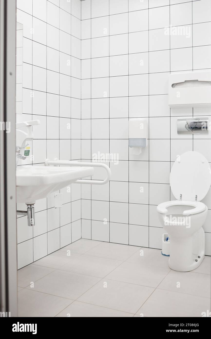 A bright restroom in a medical facility Stock Photo - Alamy