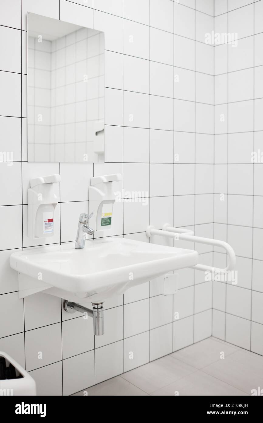 Assistance in restroom hi-res stock photography and images - Alamy