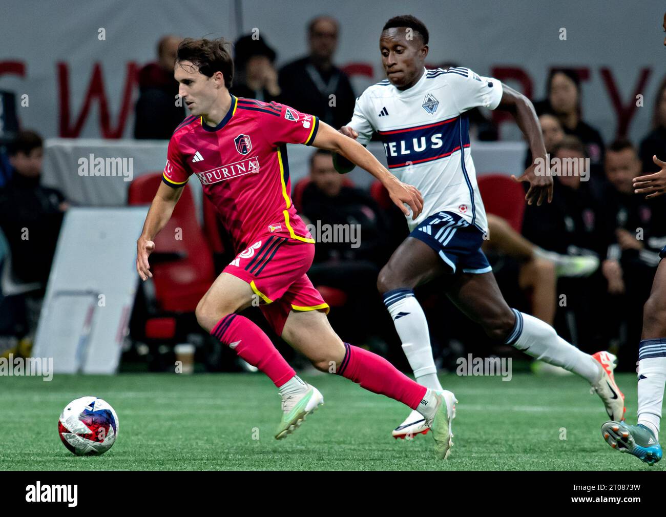 Vancouver. 4th Oct, 2023. Jared Stroud (L) of Saint Louis City FC vies ...