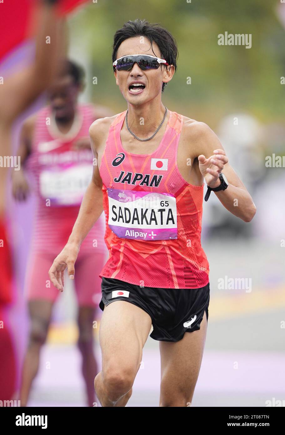 Japan's Toshiki Sadakata crosses the finish line in fourth place during ...