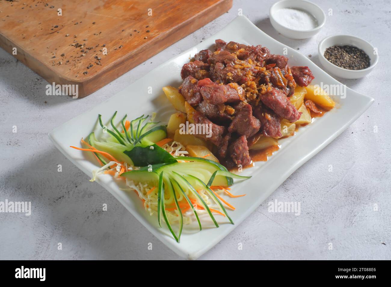 beef chunks steak food presentation Stock Photo - Alamy
