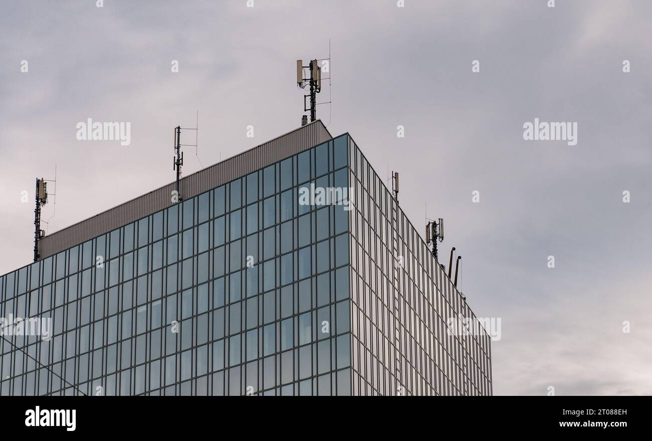 Modern office skyscraper building. Communication transmission antennas ...