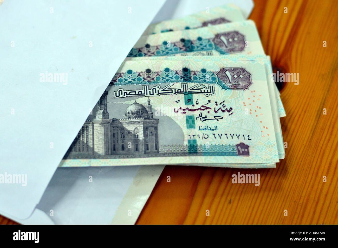 Stack of Egyptian currency of 100 EGP LE 2023 one hundred Egyptian ...